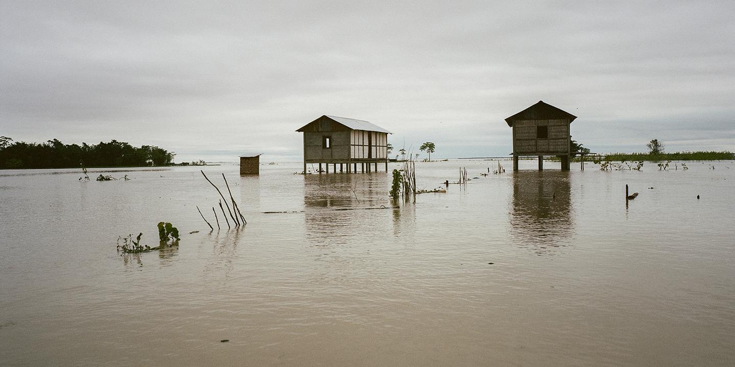 In India, the rising waters of Brahmaputra River are engulfing an ...