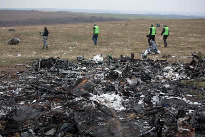 Three men sentenced to life in prison over downing of flight MH17 in 2014