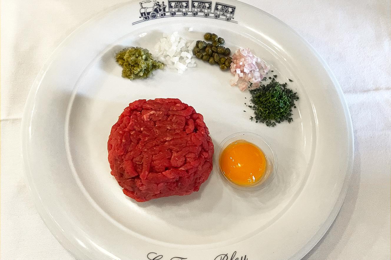 Le Train Bleu's steak tartar is savored first with the eyes, then the ...