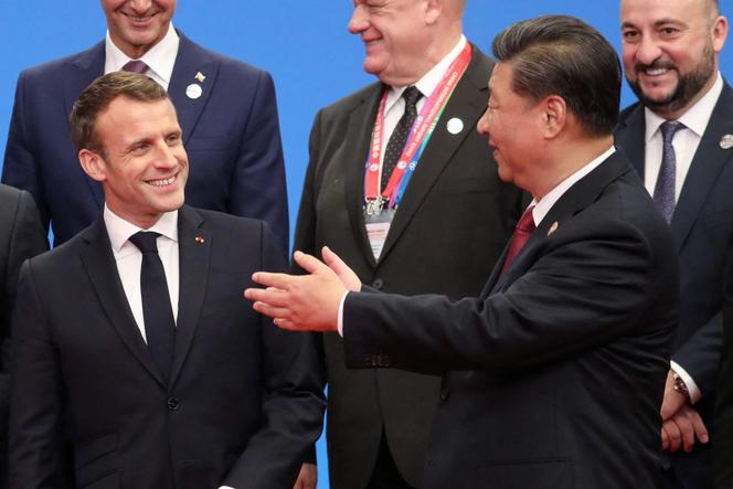 Macron says he will visit China in 'early April'
