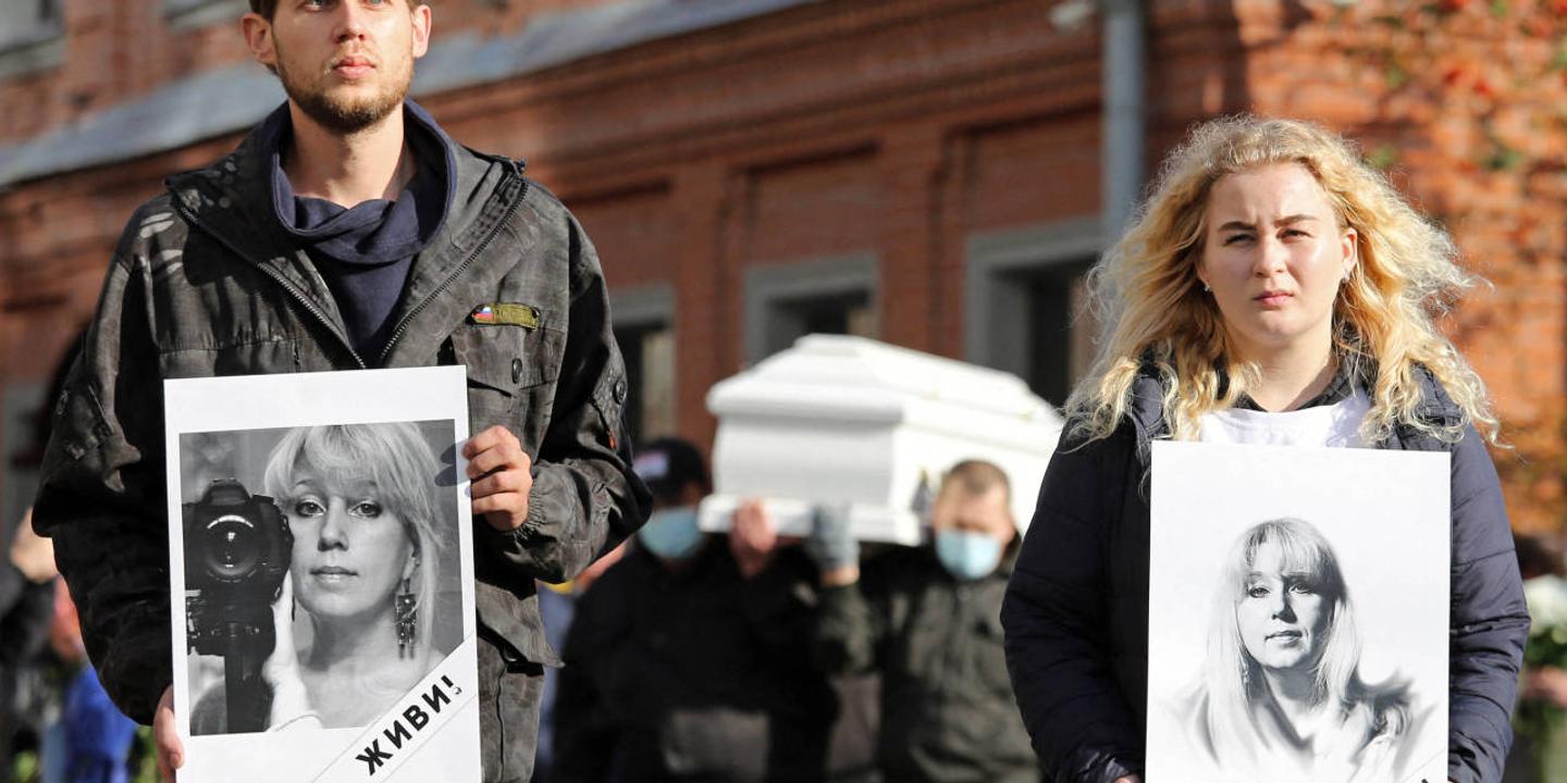The children of deceased Russian journalist Irina Slavina divided by ...