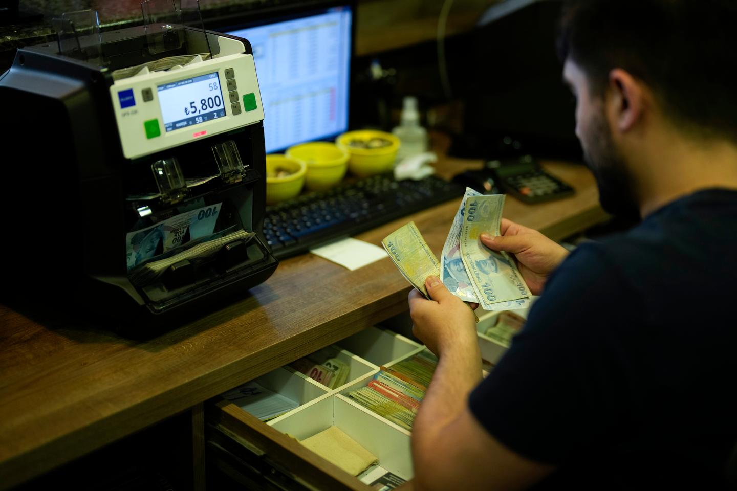 Turkey nearly doubles interest rate to fight sky-high inflation and ...