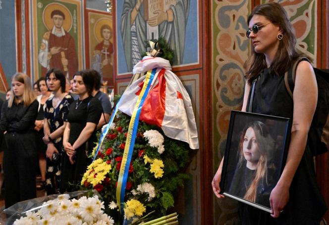 Ukrainians honor award-winning writer Amelina killed in Russian missile ...