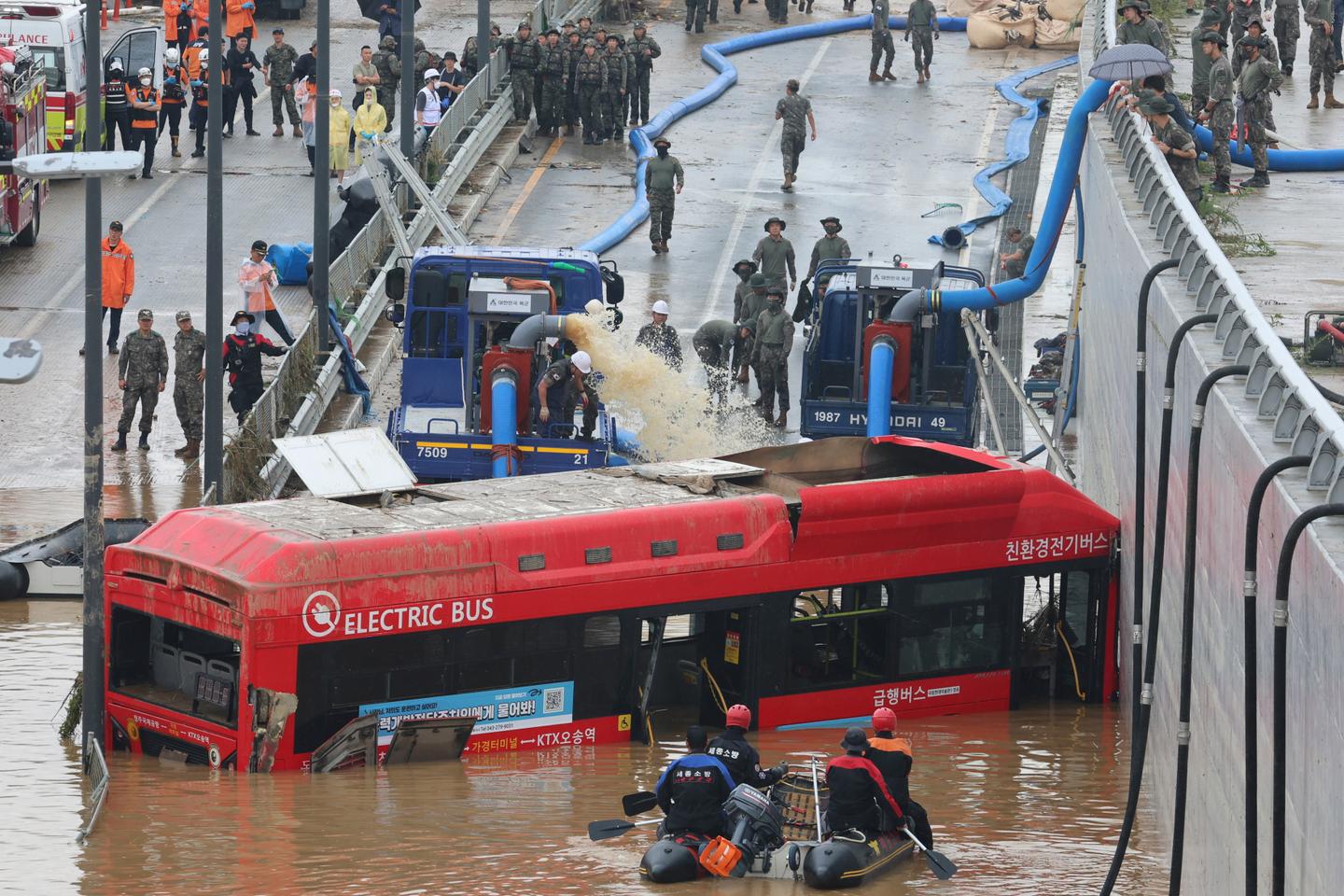 Seven bodies pulled from flooded tunnel in South Korea
