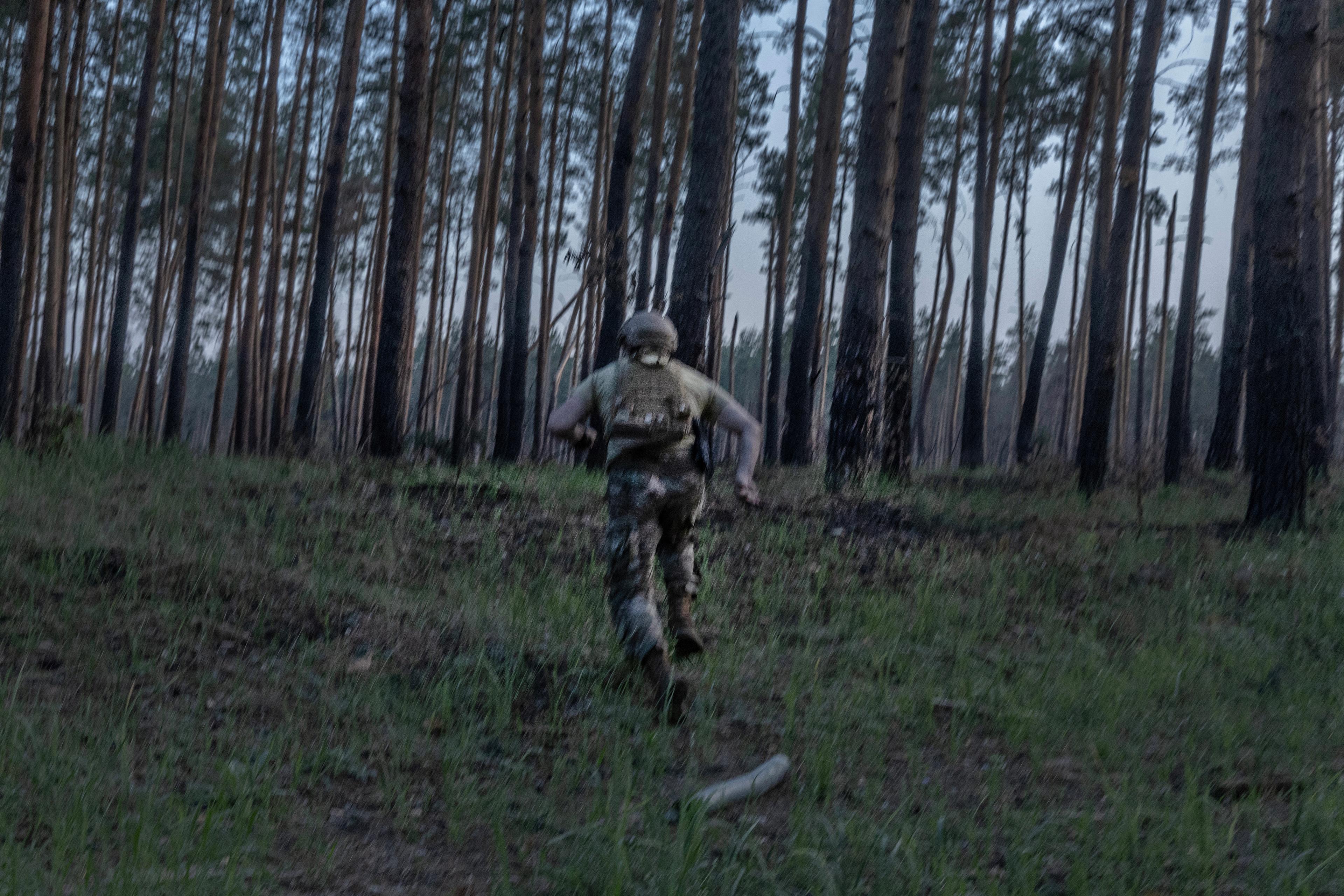 In a Ukrainian forest, soldiers push back against Russia's deadly advance
