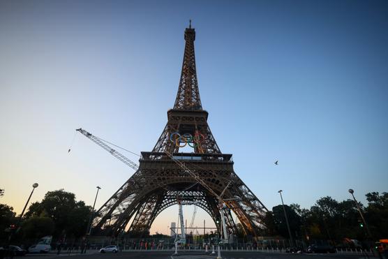 Paris 2024: Olympics organizers unveil Olympic rings mounted on Eiffel ...