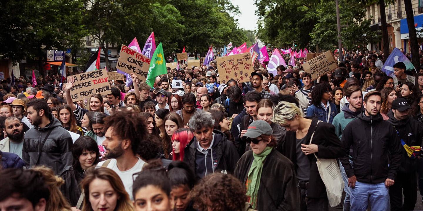 French protesters turn out in droves against far right, caught between ...