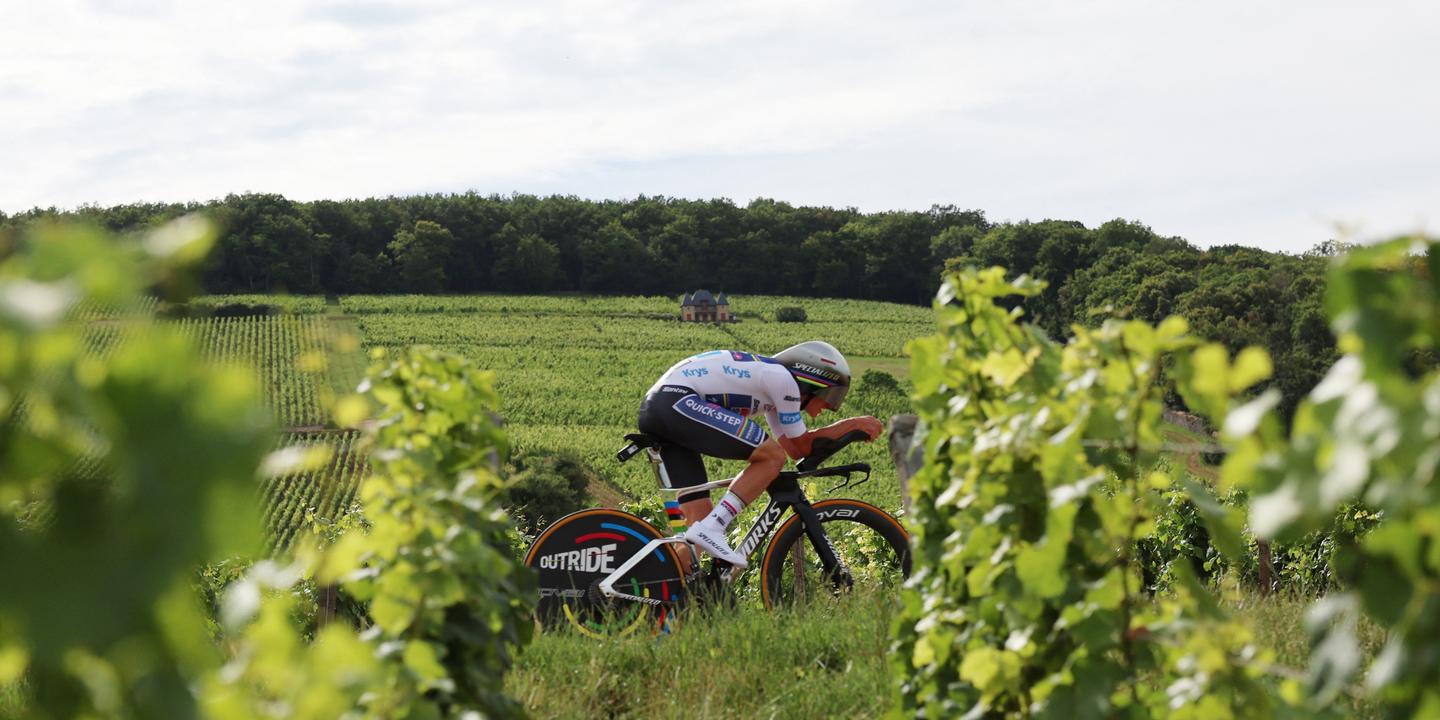 Tour de France: Pogacar stays in yellow as Evenepoel wins time trial