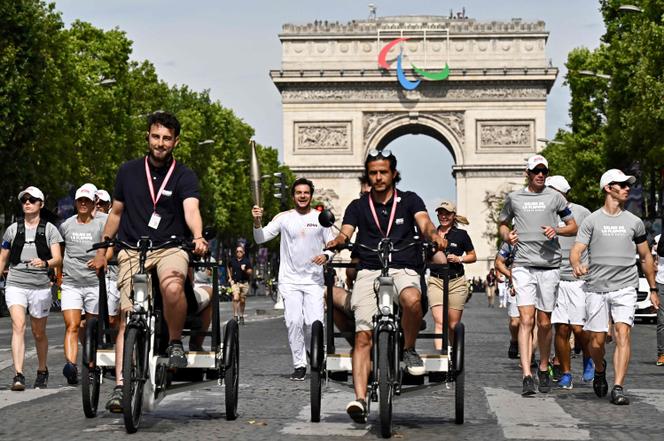 Olympic flame in Paris: A garbage collector, a K-pop icon and a BMX ...