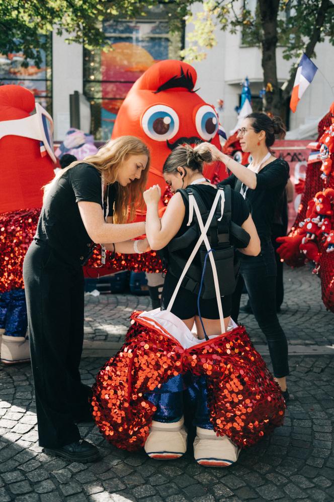 Dressed as a Paris Olympics Phryge: 'Our arms were too short to clap ...