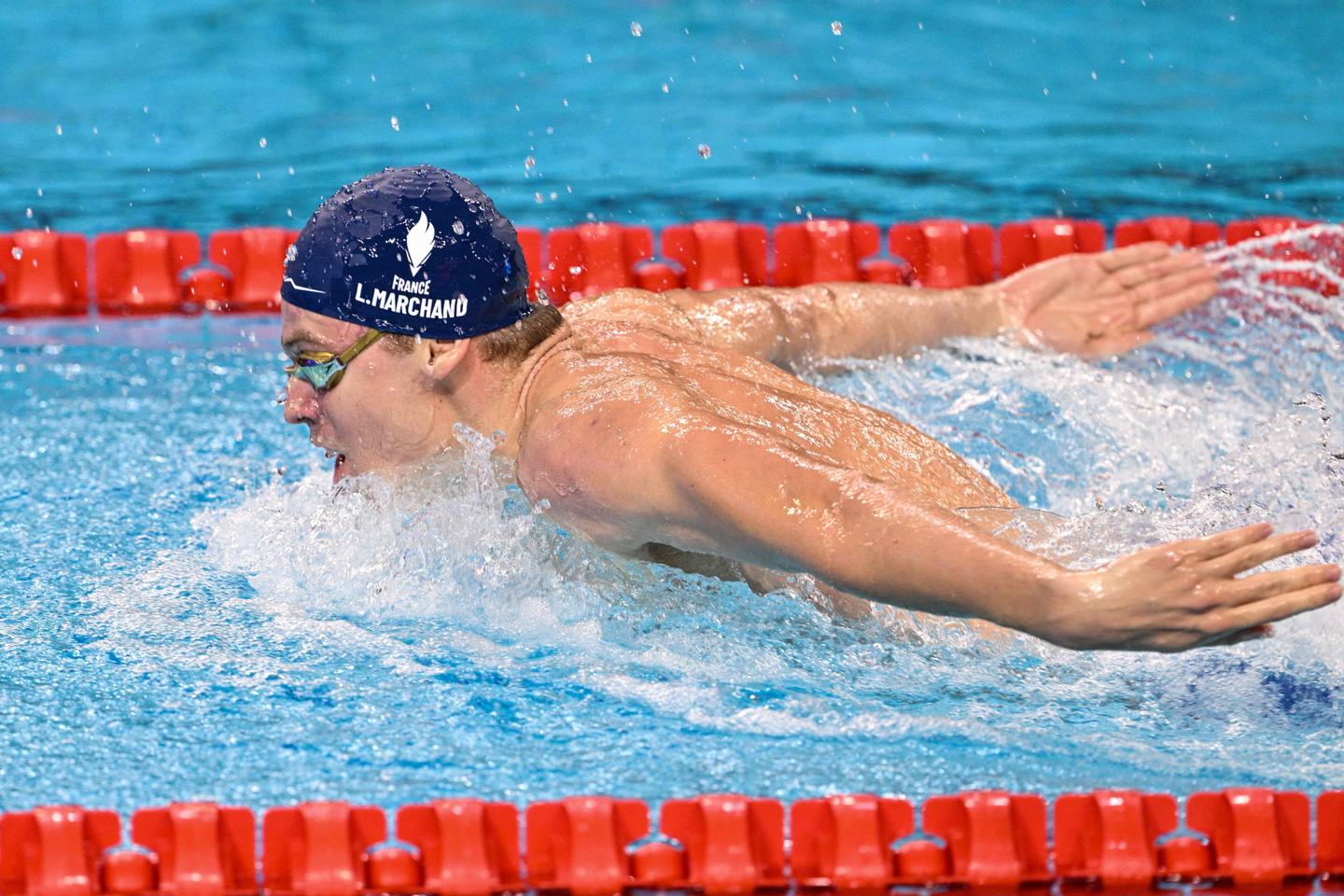 Back in the pool, French swimmer Léon Marchand wins three World Cup ...