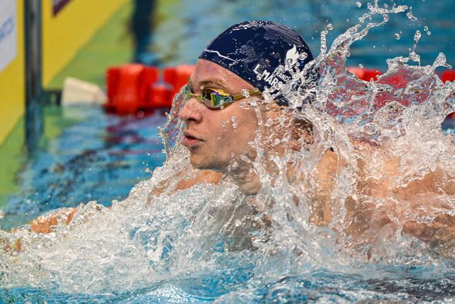 Back in the pool, French swimmer Léon Marchand wins three World Cup ...