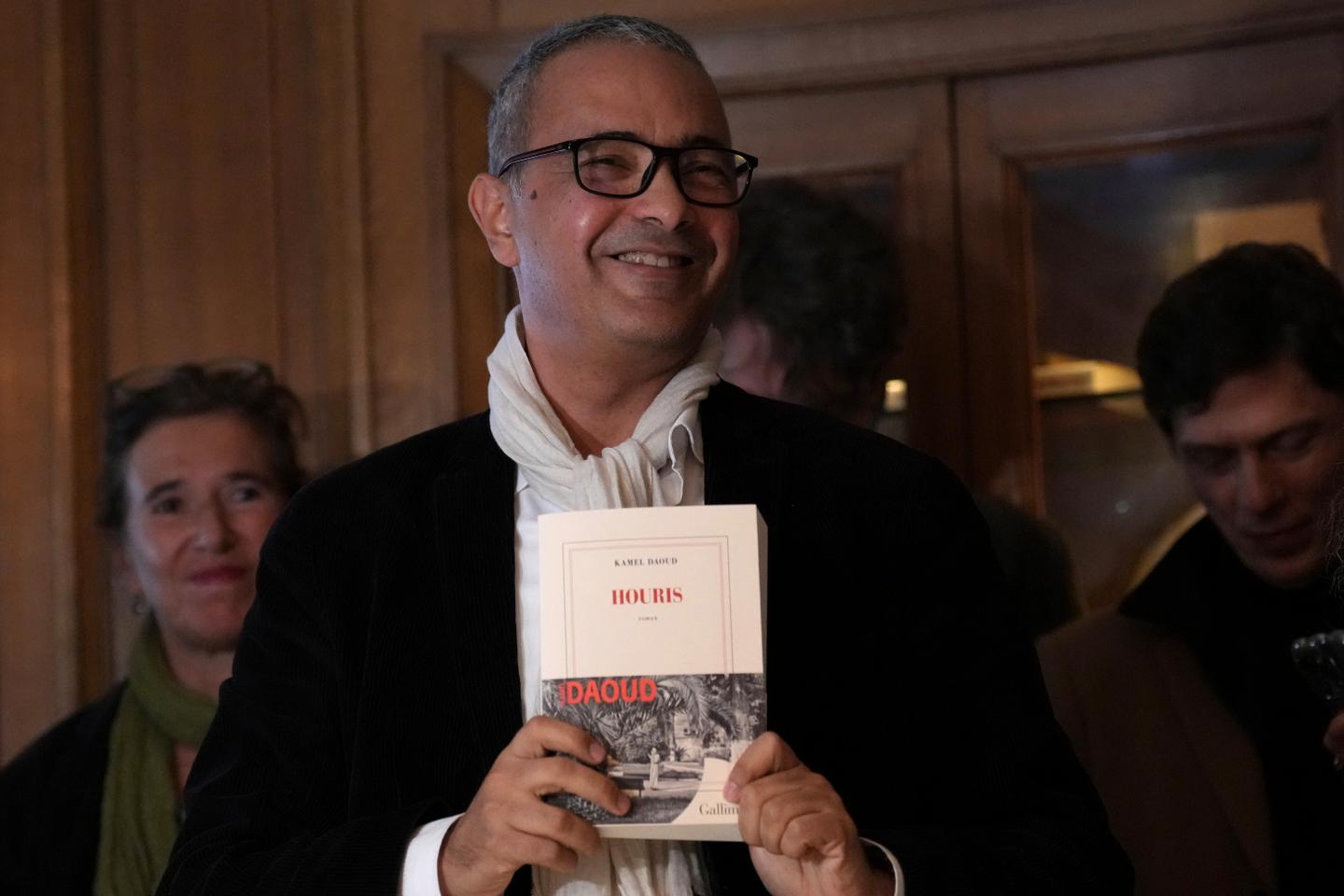 Publisher defends prize-winning French novel after Algerian victim's claims