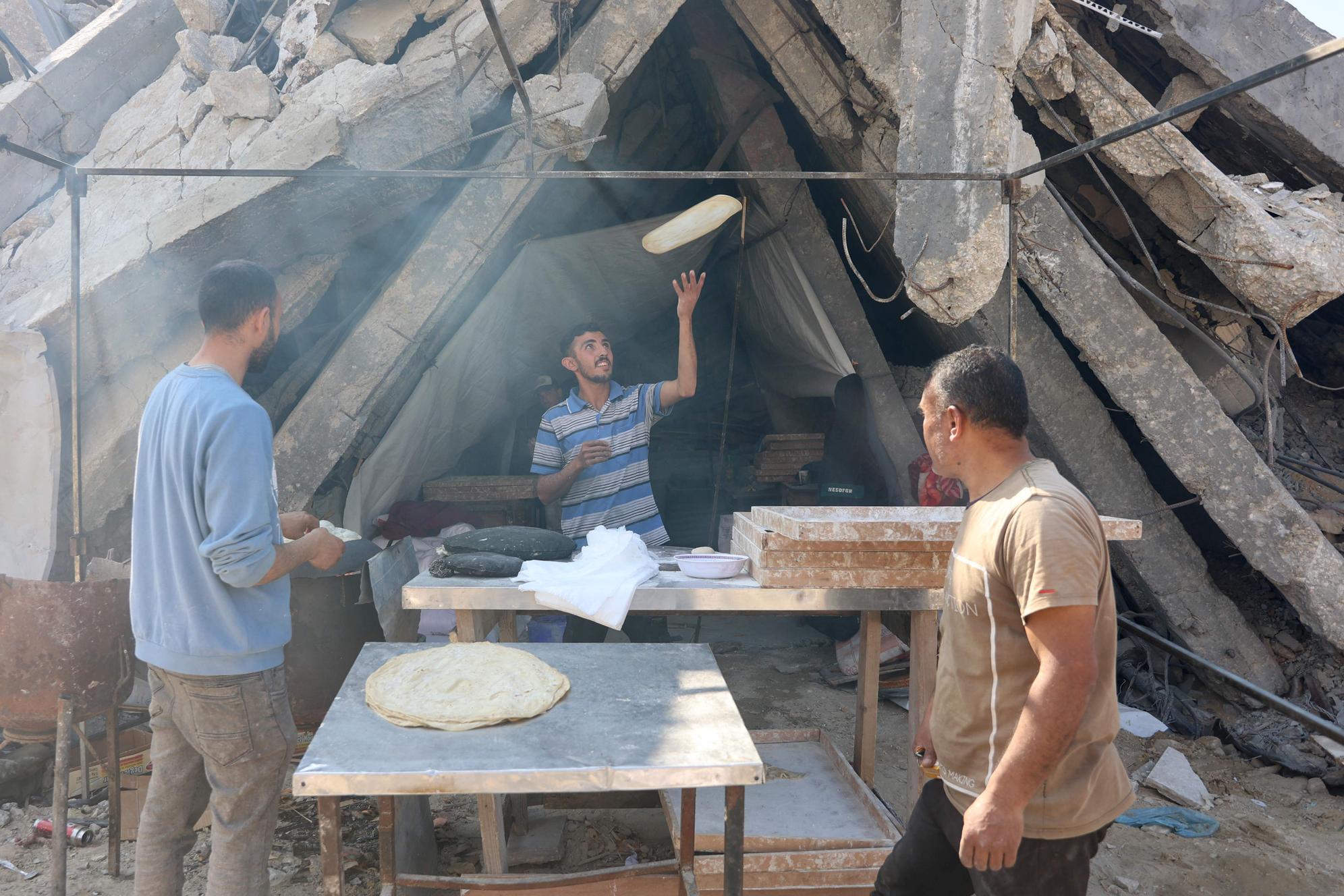 Gazans' return to a field of ruins, in pictures: 'We're all happy to be ...