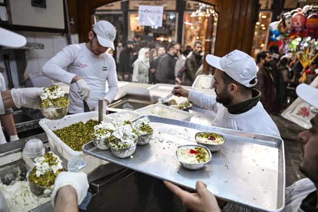 After 14 years of war, Syrians rediscover the sweetness of Bakdash ice ...