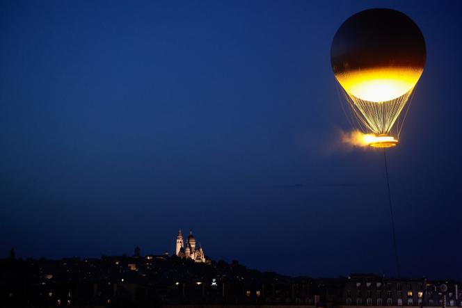 Iconic cauldron from Paris Olympic Games returns to light up summer nights