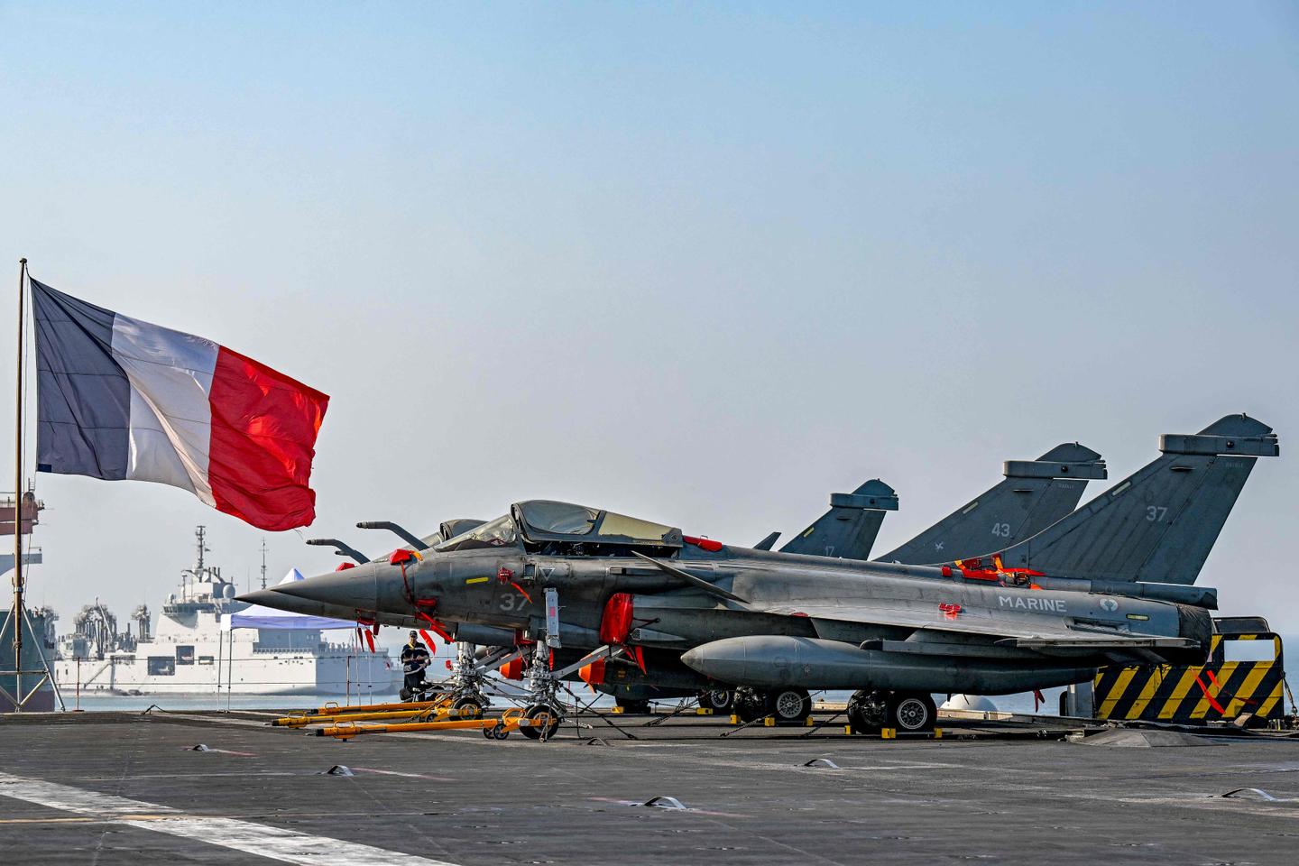 Macron says France will deploy three jets to 'help protect Polish airspace'