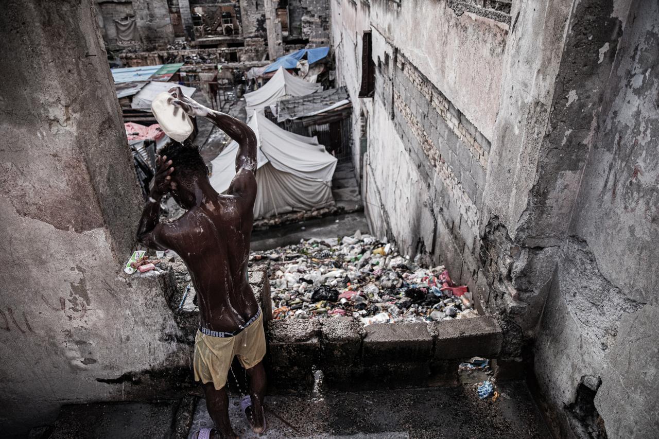 Cholera returns to Haiti as thousands of displaced people survive under ...