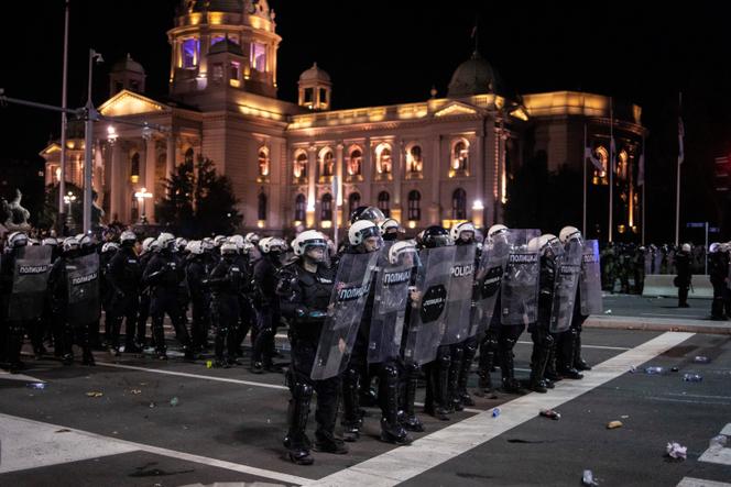 Riot police separate opponents and loyalists of Serbia's president as ...