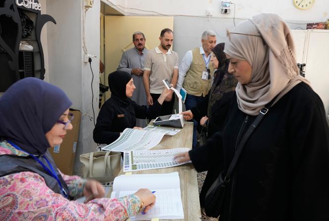 Iraqi voters turn out in unexpectedly high numbers despite calls for a ...