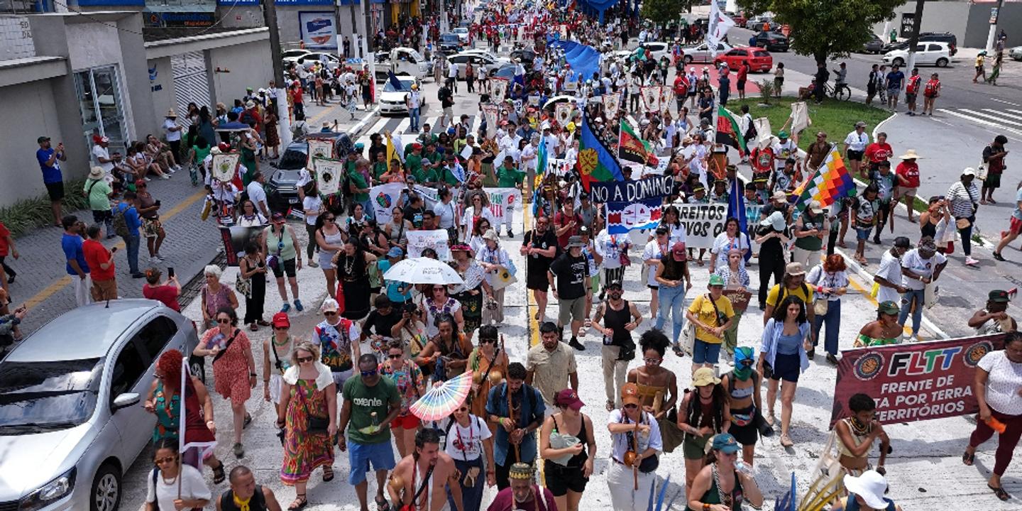 Tens of thousands march at COP30 as Indigenous-led protest shakes ...