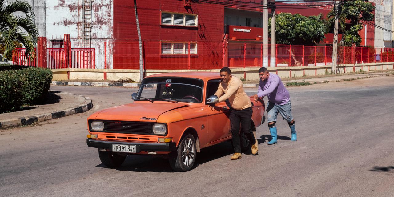 A bike journey across crisis-ridden Cuba under the watchful eye of state security